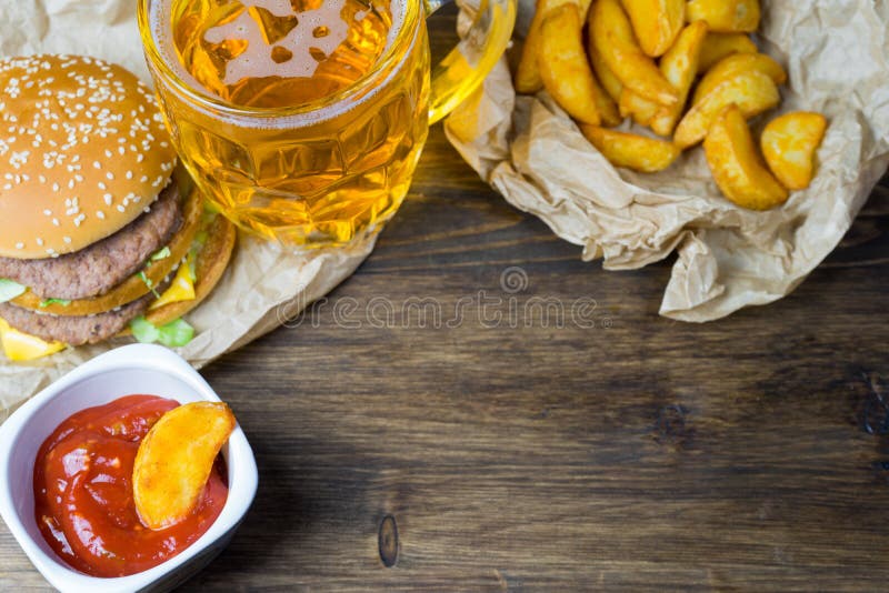 Fast Food and a Chilled Glass of Fresh Light Beer. Stock Image - Image ...