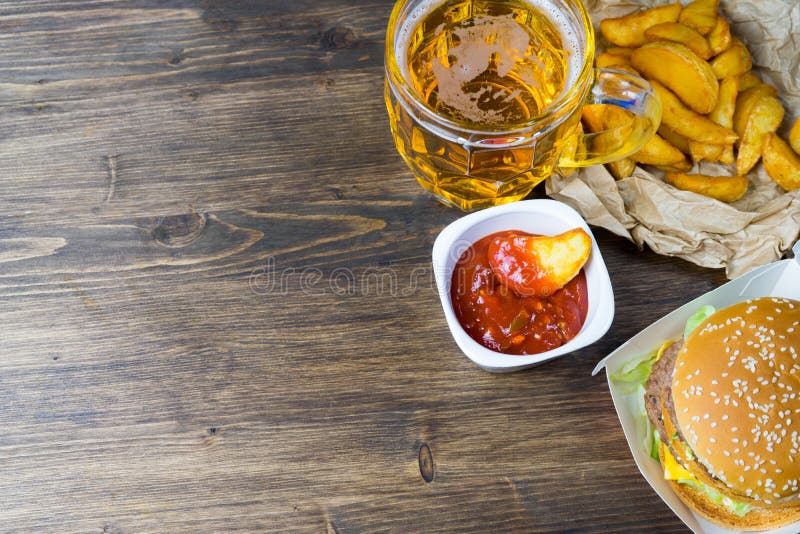 Fast Food and a Chilled Glass of Fresh Light Beer. Stock Image - Image ...