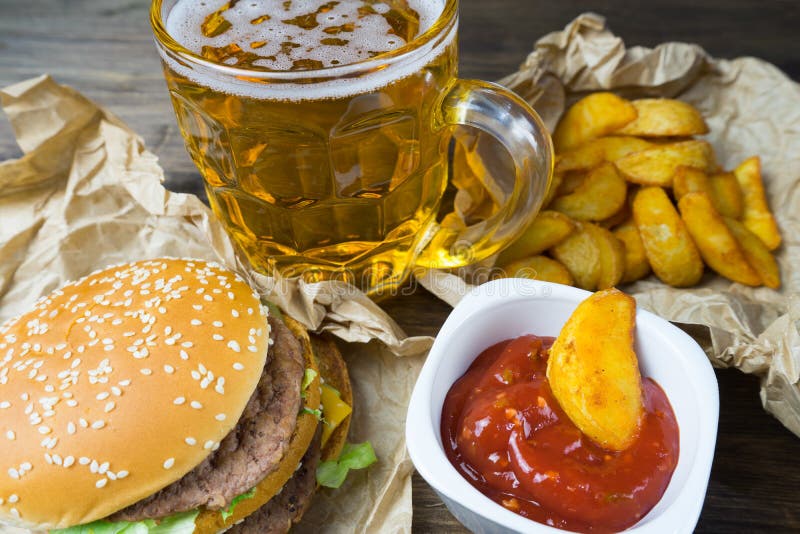 Fast Food and a Chilled Glass of Fresh Light Beer. Stock Image - Image ...