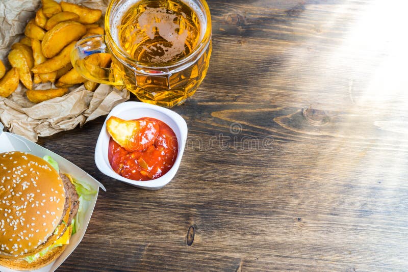 Fast Food and a Chilled Glass of Fresh Light Beer. Stock Photo - Image ...