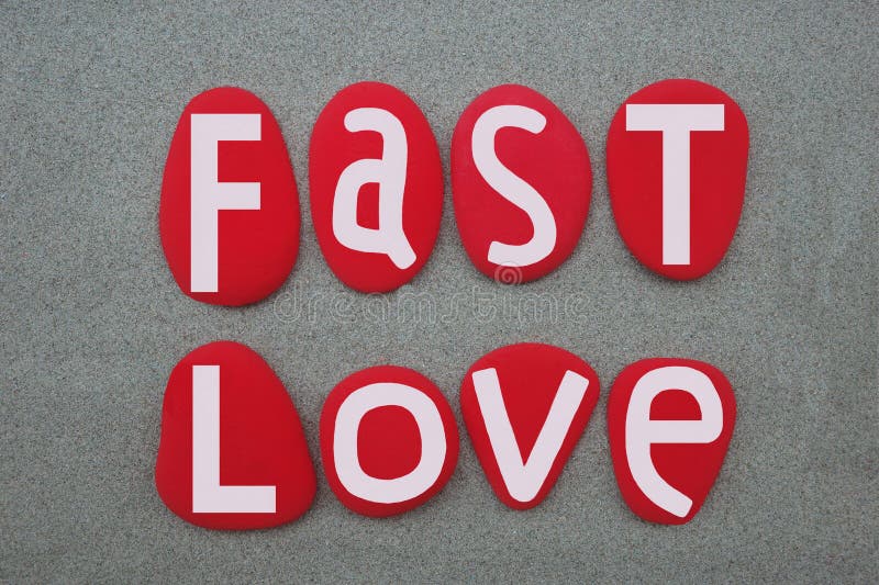 Fast Life, Creative Slogan Composed with Red Colored Stone Letters Over ...