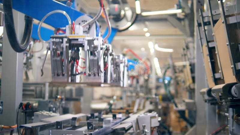 Fast Motion of Packaging Process Held by a Robotic Mechanism Stock ...