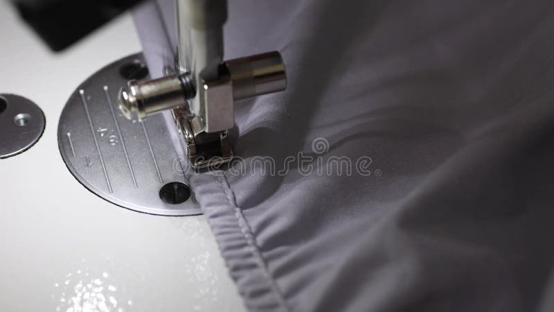 Needle for Sewing Machine in Motion the Close-up of the Sewing Machine ...