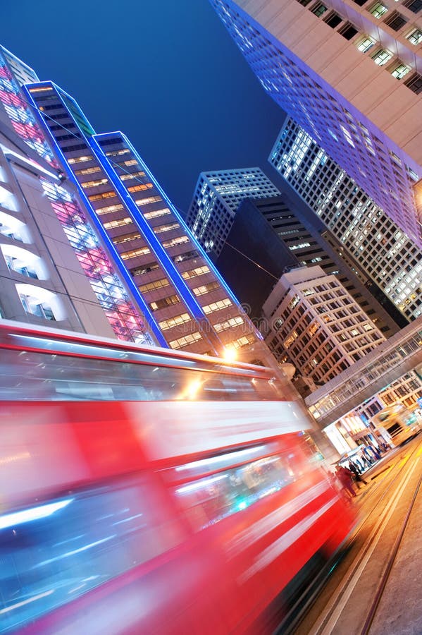 Fast moving bus at night stock image. Image of city, building - 11994499