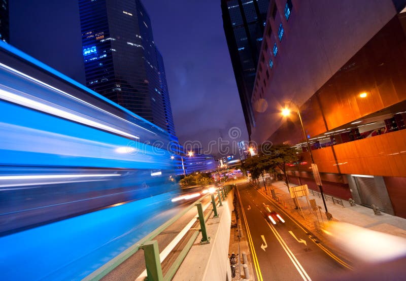 Fast moving bus at night stock photo. Image of building - 11994506