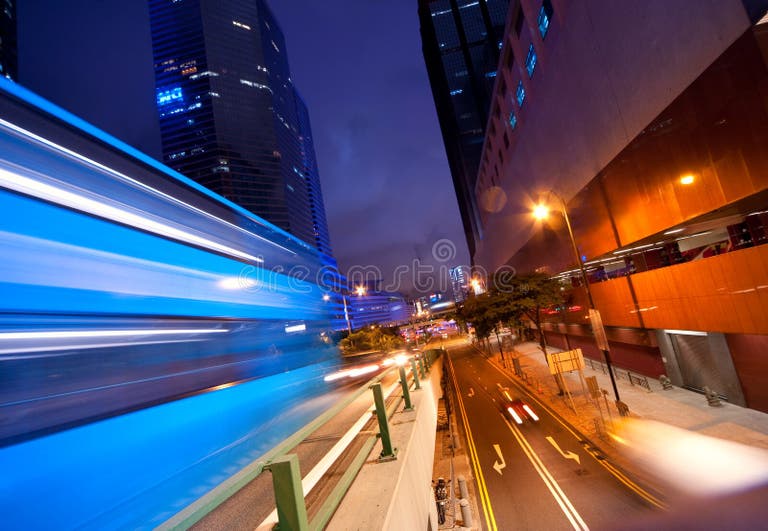 Fast moving bus at night stock photo. Image of building - 11994506