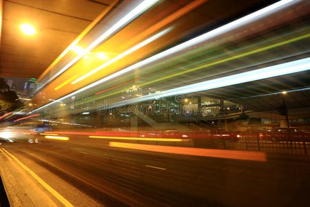 Fast moving bus at night stock photo. Image of cityscape - 13145636
