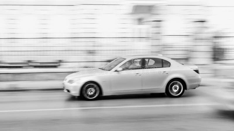 Fast Moving Car on the City Roadway in Motion Blur Stock Image - Image ...