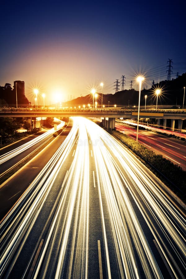 Traffic Light and Moving Cars Passing Fast through Street on Snowy Day ...