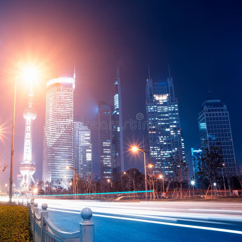 Fast moving cars at night stock photo. Image of building - 31713058