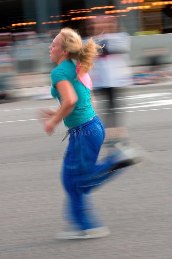 Fast Moving Female Runner editorial stock image. Image of female - 4188484