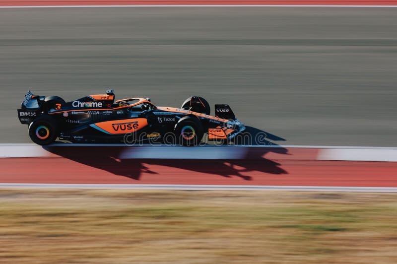 Fast-moving Racing Car Speeds Along a Racetrack, Creating a Dynamic and ...