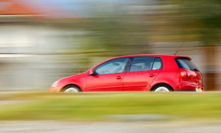 Fast moving red car stock photo. Image of camera, joyride - 2511276