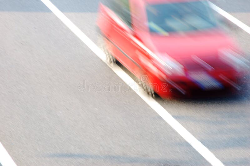 Fast moving red car stock photo. Image of blurred, drive - 3256492