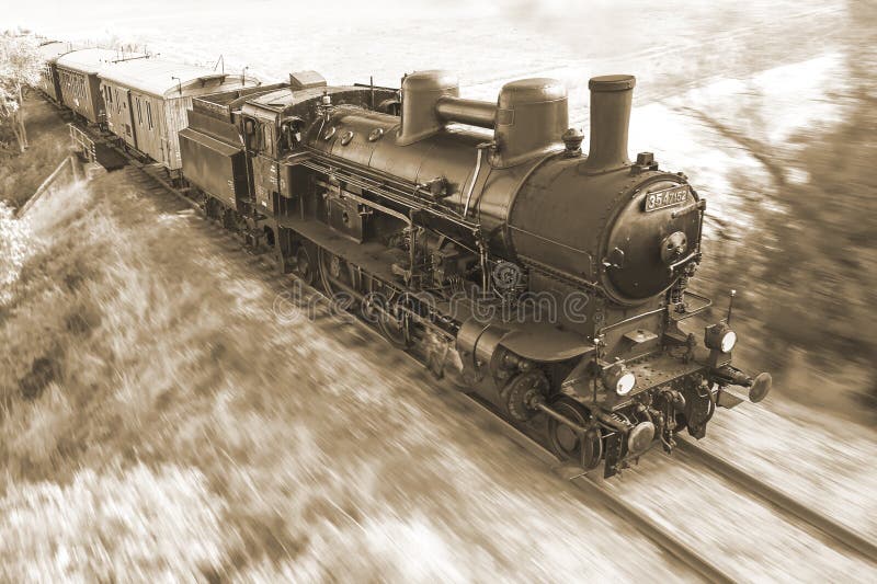 Fast Moving Steam Train while Driving between Fields Stock Photo ...