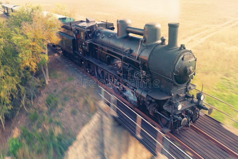 Fast Moving Steam Train while Driving between Fields Stock Photo ...
