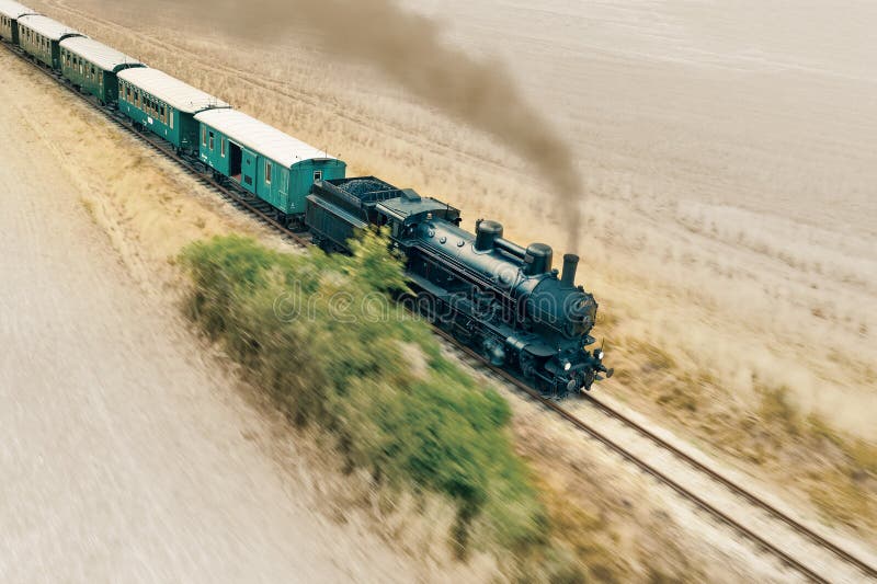 Fast Moving Steam Train while Driving between Fields Stock Image ...