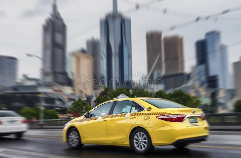 Fast Moving Taxi in Downtown Melbourne, Australia Stock Image - Image ...