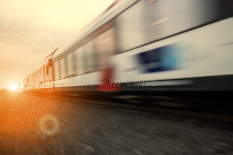 Fast moving train at dawn stock image. Image of perspective - 105832911