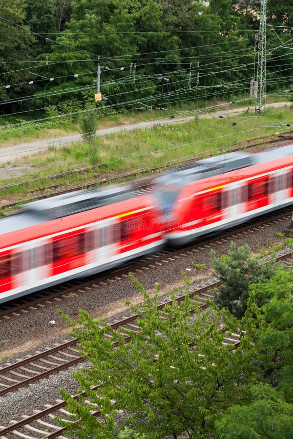 Fast Moving Train with Red Stripe Stock Image - Image of coaches ...