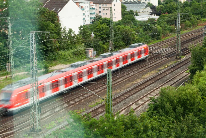 Fast Moving Train with Red Stripe Stock Image - Image of trains ...