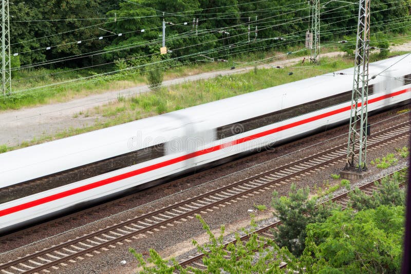 Fast Moving Train with Red Stripe Stock Photo - Image of countryside ...