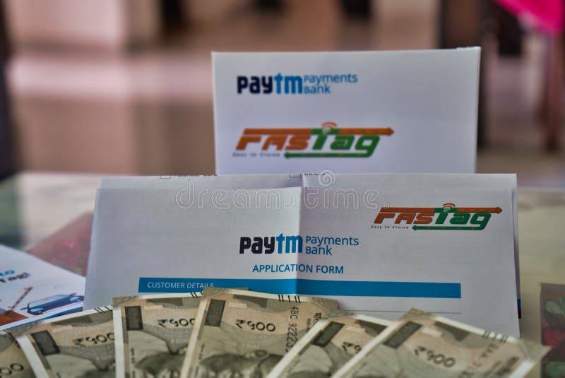 Fast Tag on a Beautifully Crafted Table Along with Currency Notes, the ...