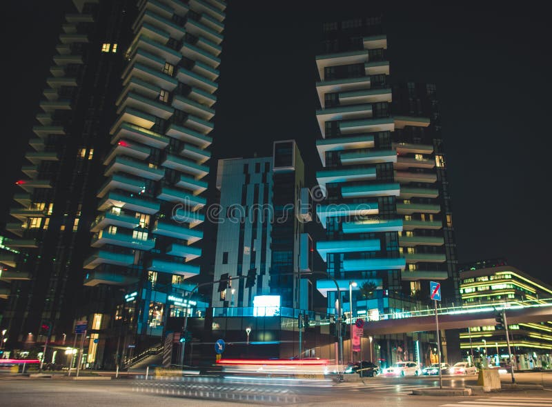 Fast Traffic and Skyscrapers in the Busy Modern City by Night Stock ...
