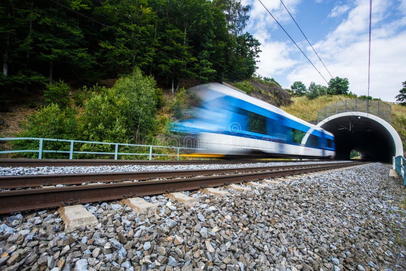 Fast Train Passing through a Tunnel on a Lovely Summer Day Stock Photo ...
