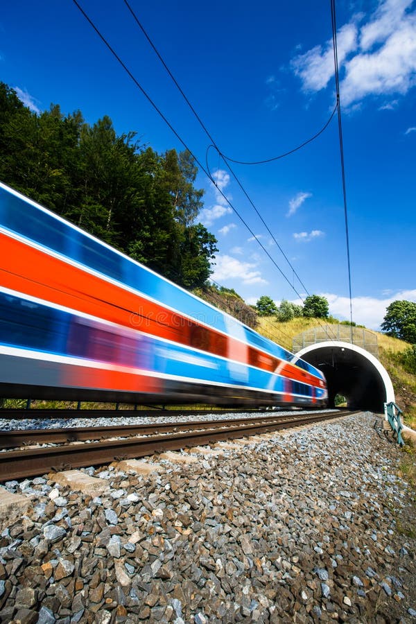 Fast Train Passing through a Tunnel on a Lovely Summer Day Stock Photo ...