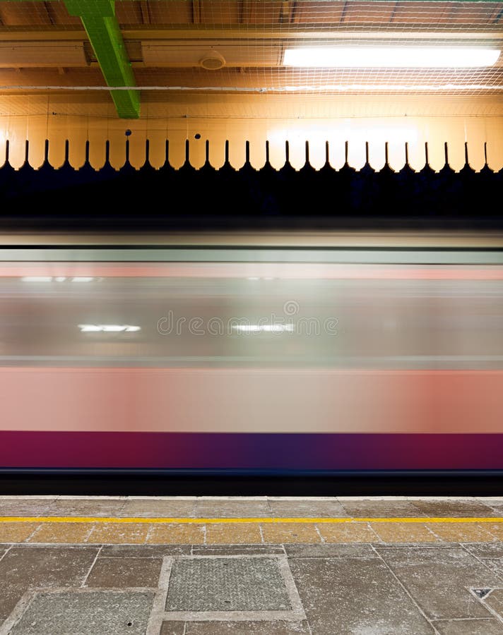 Fast Train and Station at Night, London, UK Stock Photo - Image of ...