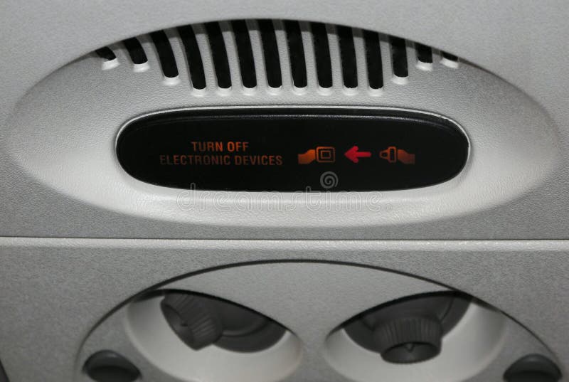 Fasten Seatbelt Turn Off Electronic Devices Sign Stock Photo - Image of ...