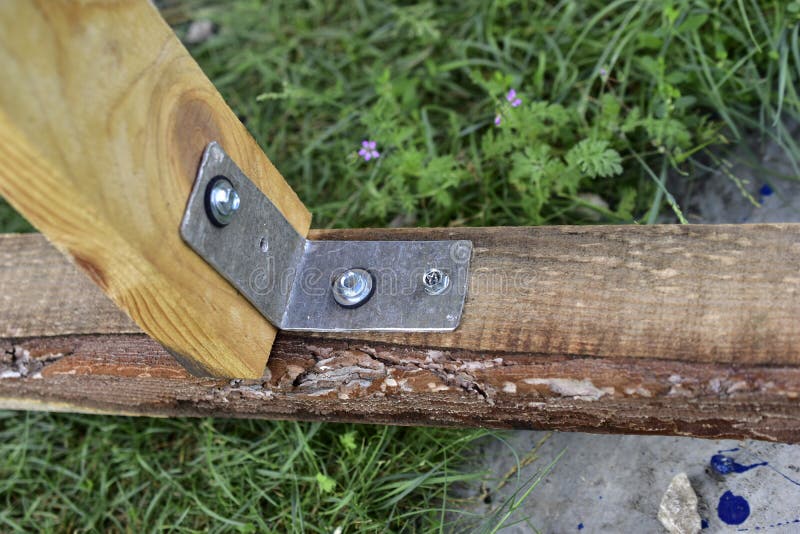 Fasteners of a Wooden Structure with the Help of an Iron Corner and ...