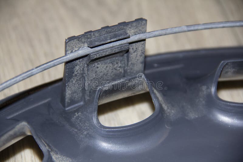 Fastening the Plastic Cap To the Wheel Stock Image - Image of metal ...