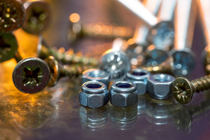 Fastening Screws and Screws of Different Sizes on the Background of the ...