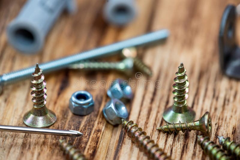 Fastening Screws and Screws of Different Sizes on the Background of the ...