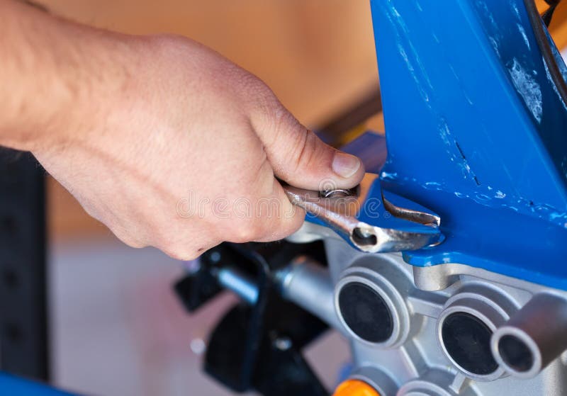 Fastening the Screws on a Small Machine Stock Photo - Image of prepare ...