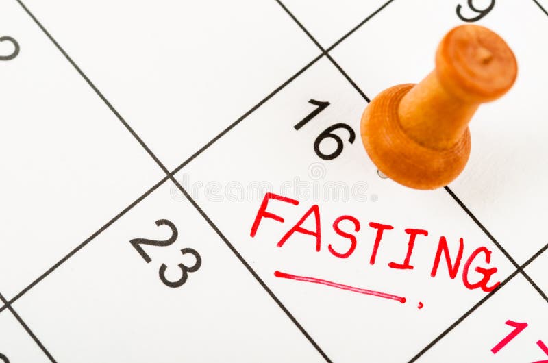 Fasting Text Writing in a Calendar Page with Wooden Pin Stock Image ...