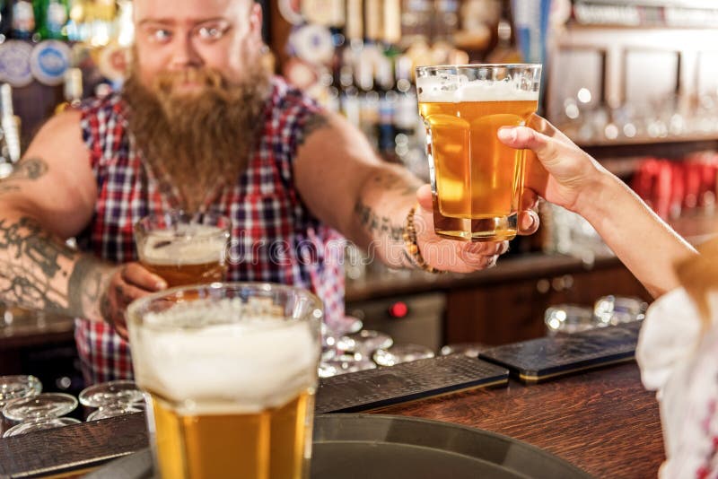 Fat Bartender Holding Beer in Arm Stock Image - Image of beard ...