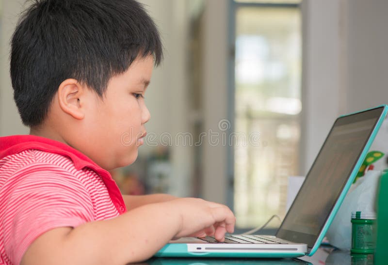 Fat Boy Use Notebook To Doing His Homework Stock Photo - Image of cute ...