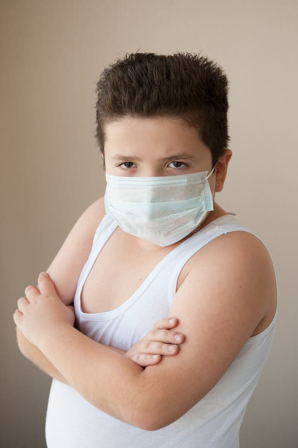 Fat Boy Wearing Shirt and Surgical Mask Looking at Camera Stock Image ...