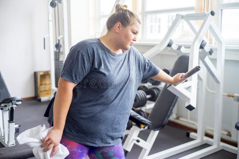 Fat girl in a gym stock image. Image of large, dieting - 101374055