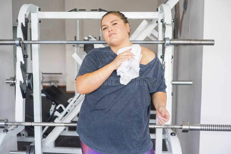 Fat girl in a gym stock image. Image of obese, curves - 101374579