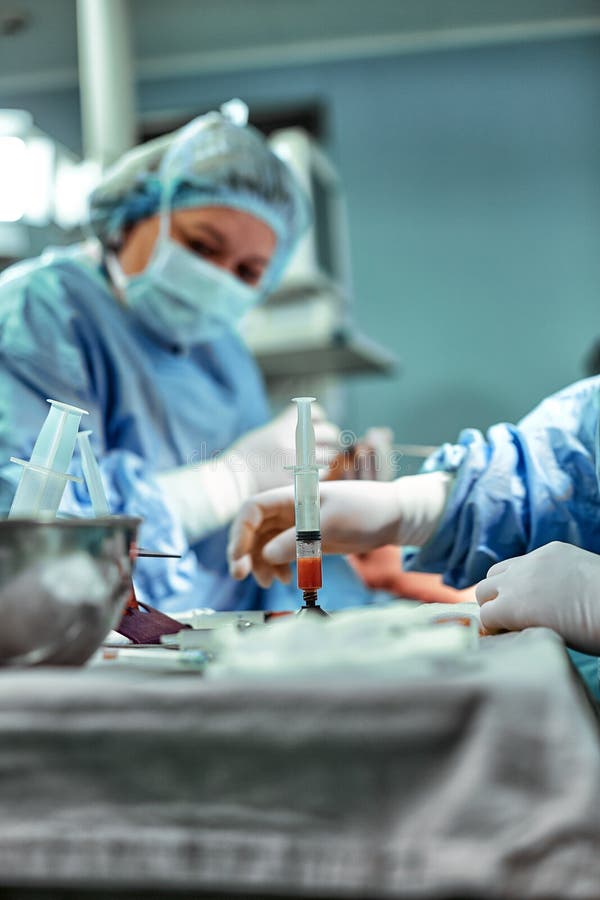 Fat from Liposuction in Syringes with Stainless Stand in Operation Room ...