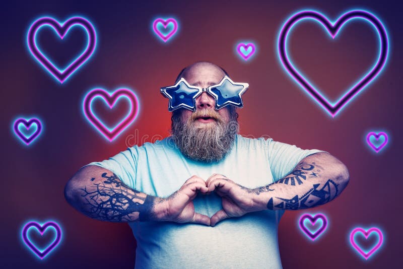 Fat Man with Beard, Tattoos and Sunglasses Makes Heart Shape with Hands ...