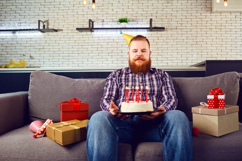 A Fat Man with a Birthday Cake in the Room. Stock Photo - Image of male ...