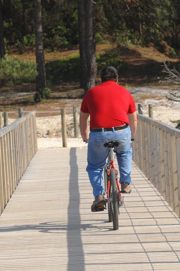 Fat Man Cycling on the Seaside Stock Photo - Image of cycle, enjoy ...