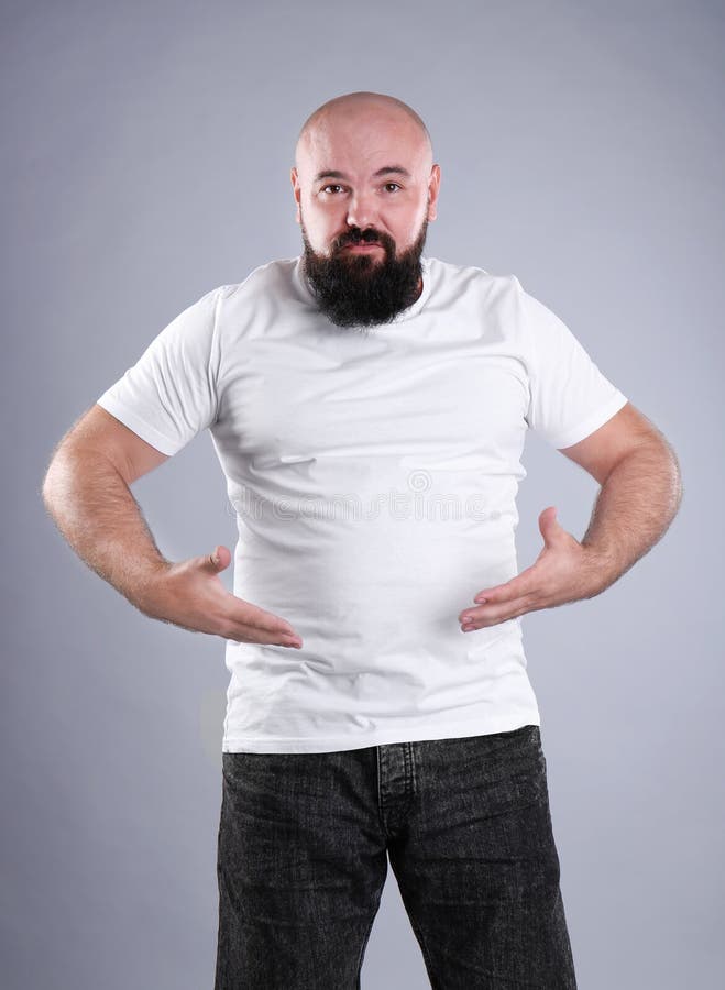 Fat man on grey background stock photo. Image of grey - 127820008