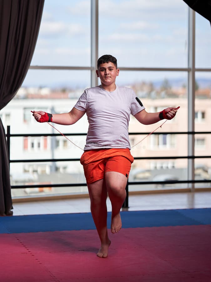 Fat Man Jumping Rope in the Gym Stock Photo - Image of club, jumping ...