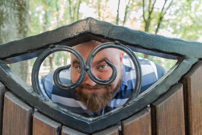 Fat Man in the Park Looks into the Frame, a Portrait of a Man with ...